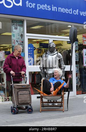 PDSA shop volunteer publicising the shops goods in Wellington ...