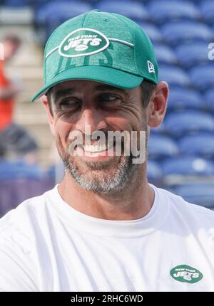 New York Jets quarterback Aaron Rodgers, left, and equipment manager ...