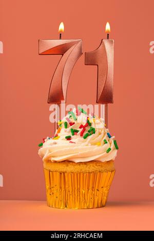 birthday cake with number 71 - cupcake on orange background with ...