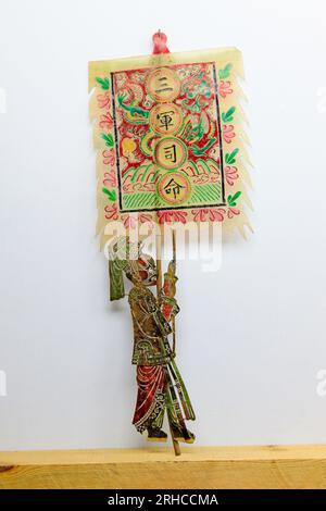 Shadow play puppet props -- army flag, closeup of photo Stock Photo - Alamy