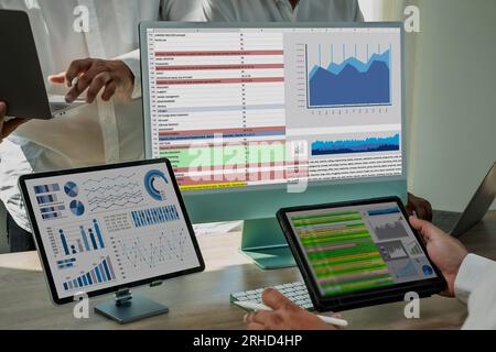 Businessmen work hard. Using analytics, Data analytics, statistics ...