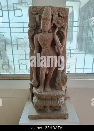 A statue of Vishnu. Holding Shankha (conch), Chakra (disc), Gada (mace ...