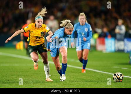 Australia's Ellie Carpenter and England's Alessia Russo battle for the ...
