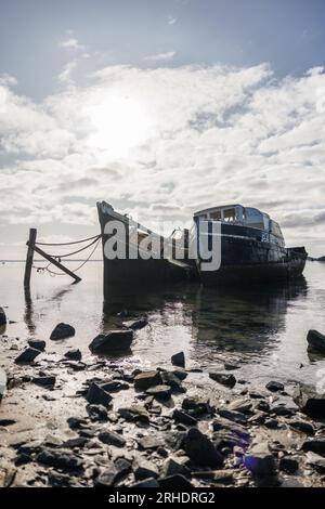 Two ships wrecked off the shore of Bluff Stock Photo - Alamy