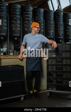 Barista accepts new batch of coffee unpacking boxes, preparing for ...