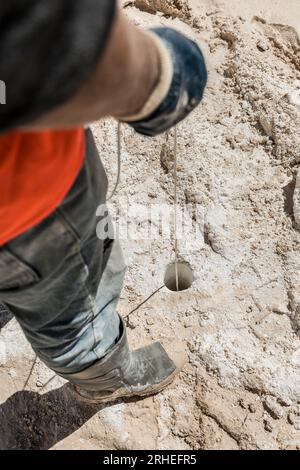 beautiful and artistic photograph of a marble mine. including men ...