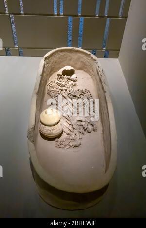 Late Dilmun clay Sarcophagi - clay coffin with burial offerings - bones ...