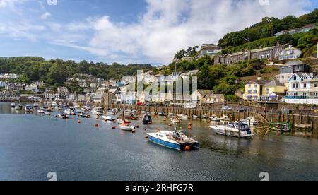 Looe, UK - August 2023: View of harbour and arched bridge over East ...