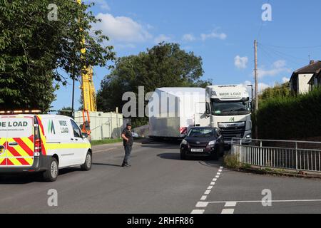 Lorry transporting prefabricated house module to building site ...