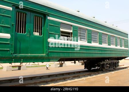closeup of green train cars in a station Stock Photo - Alamy