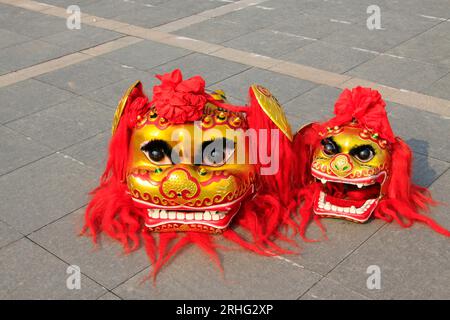 lion dance props on the gray ground Stock Photo - Alamy