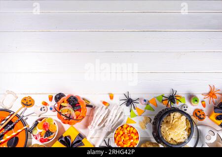 Halloween sweets and snacks table. Set of Halloween dinner party foods ...