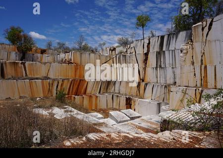 abandoned marble quarry with big colorful cracked marble blocks in the ...