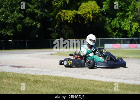 Adult go-kart drivers raced in national races at Badger Kart club Wolf ...
