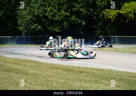 Adult go-kart drivers raced in national races at Badger Kart club Wolf ...