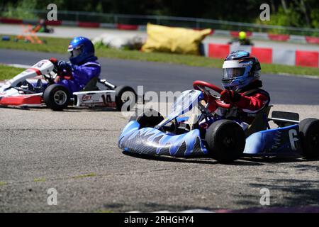 Adult go-kart drivers raced in national races at Badger Kart club Wolf ...