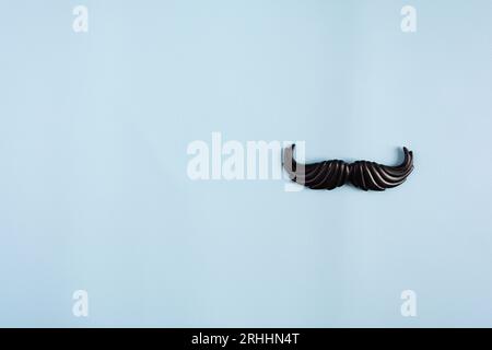 Curly mustaches on colorful background. Fake mustache. Top view Stock ...