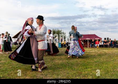 Locals in traditional seto folk costumes dancing, celebrating estonian ...