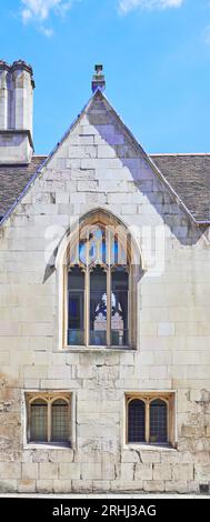 A trio of windows on a stone wall at Pembroke College, founded in the ...