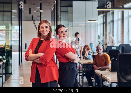 Group of determined businesswomen confidently pose side by side in a ...