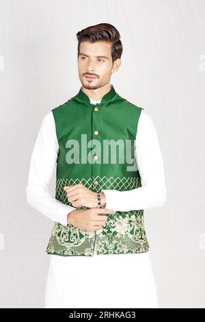 MALE MODEL POSING IN PAKISTANI TRADATIONAL DRESS Stock Photo - Alamy