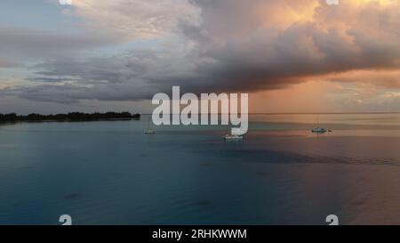 Aerial sunset views of the stunning Bora Bora Atoll; French Polynesia ...