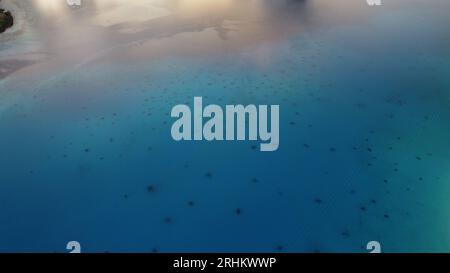 Aerial sunset views of the stunning Bora Bora Atoll; French Polynesia ...