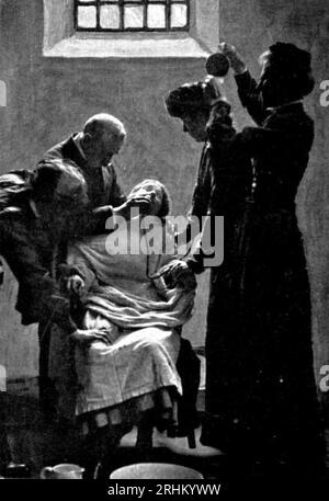 SUFFRAGETTES A suffragette is force fed in HM Prison Holloway,London ...