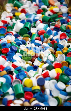 Color plastic bottle caps isolated on white background Stock Photo - Alamy