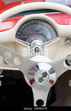 Colour photographs of a range of corvette stingray cars including close ...