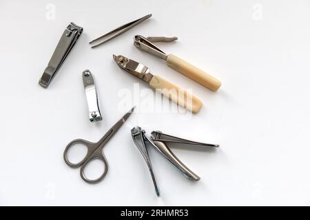 Nail clippers and scissor isolated in white Stock Photo - Alamy