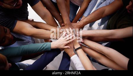 Business Team Huddle. Diverse Friends Hands Commitment Stock Photo - Alamy