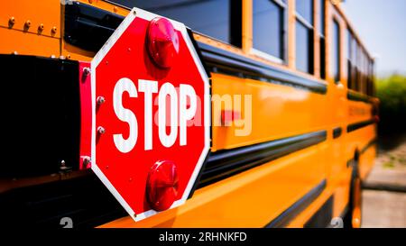 Stop sign on school bus Stock Photo - Alamy