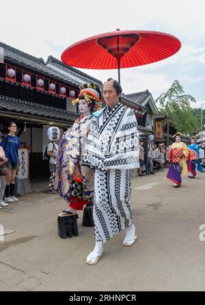 Oiran courtesans parade through the streets of Edomura Wonderland with ...