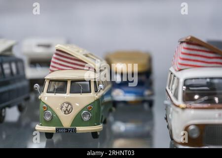 Toy or model Volkswagen vans with pop-up tops for camping on display ...