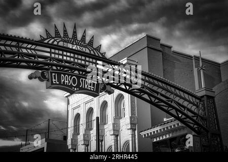 A gate and sign over El Paso Street in the downtown area of El Paso ...