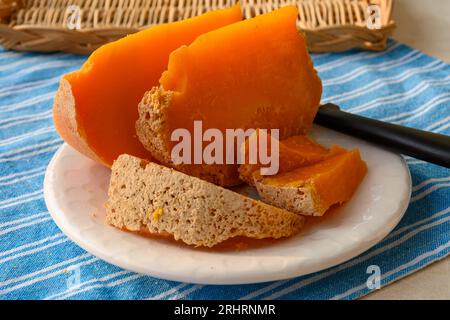 Pieces of native French aged cheese Mimolette, produced in Lille with ...