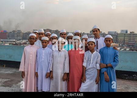 A group of students on the roof top of a madrasha (islamic school) in ...