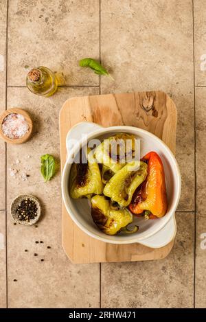 step-by-step preparation of ingredients for pepper soup . baked peppers ...