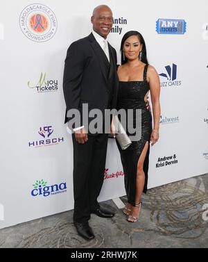 (L-R) Byron Scott and Cecilia Gutierrez arrives at the 23rd Harold ...
