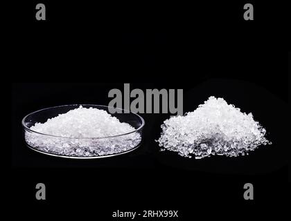 sodium chloride in petri dish, known as salt or table salt, important ...
