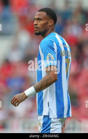 Delano Burgzorg #7 of Huddersfield Town arrives ahead of the Sky Bet ...