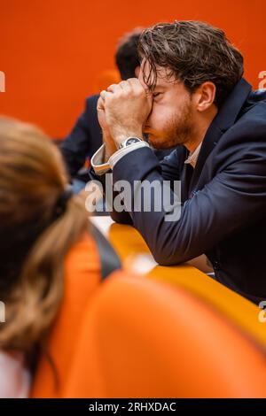 Stressed student looking disturbed and anxious while attending a ...