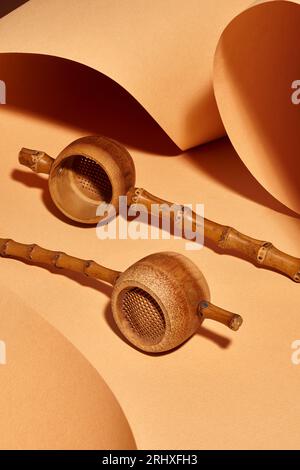 High angle of handmade bamboo tea filters on a craft paper background ...