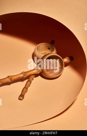 High angle of handmade bamboo tea filters on a craft paper background ...