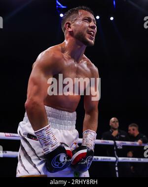 Conah Walker celebrates victory against Cyrus Pattinson in a ...
