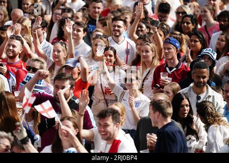 Fans ahead of a screening of the FIFA World Cup match between England ...