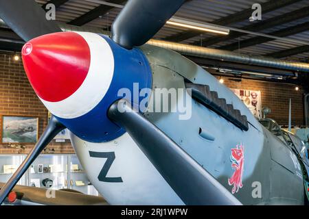 RAF Spitfire XVI on display inside the Spitfire and Hurricane memorial ...