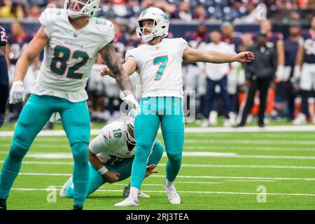 Miami Dolphins place kicker Jason Sanders (7) runs onto the field during a joint NFL football ...