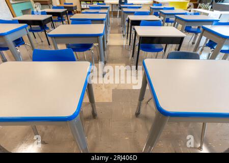 Example of an empty nondescript US High School Classroom with desks ...